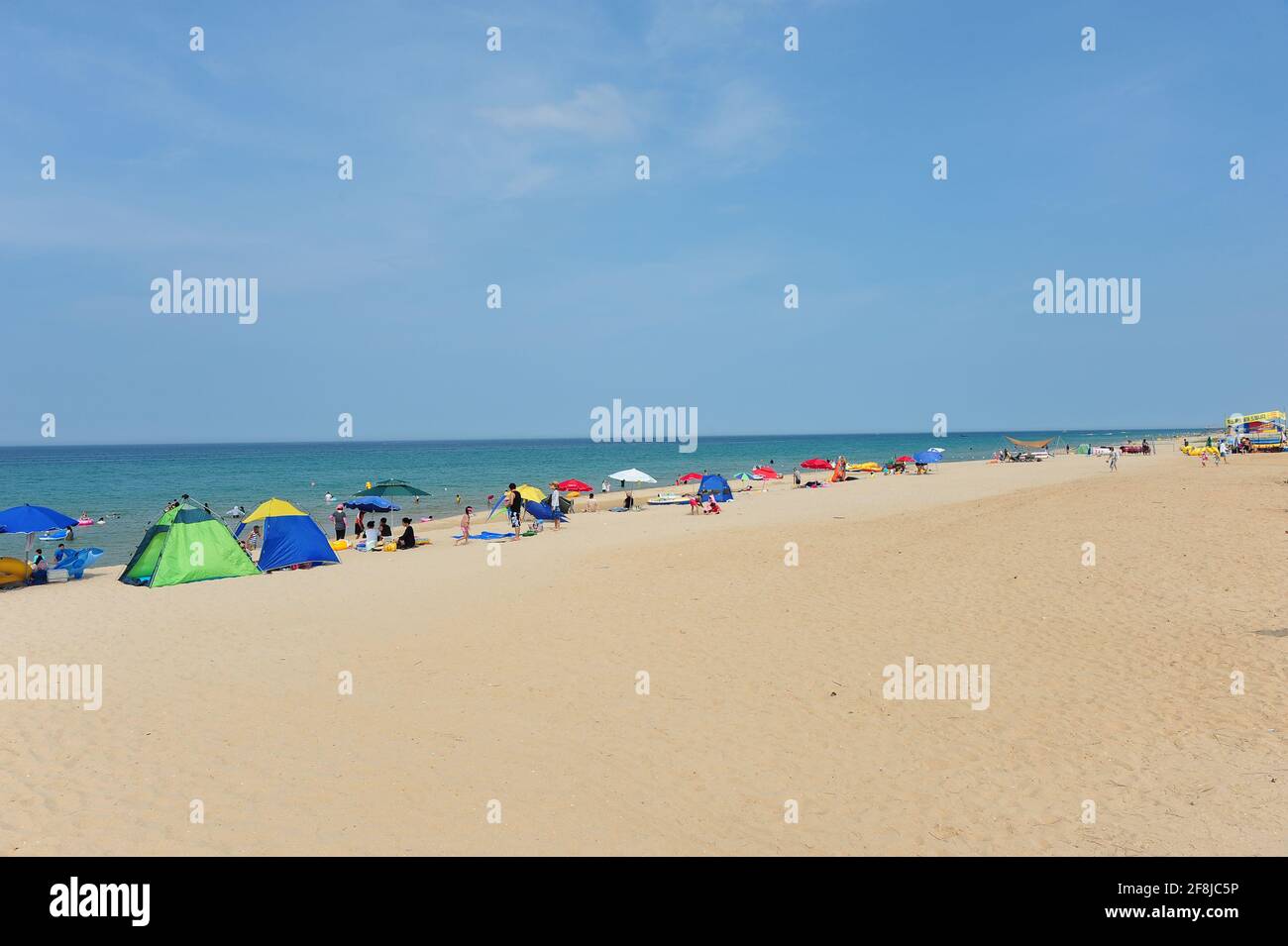 A cool beach in midsummer Stock Photo - Alamy