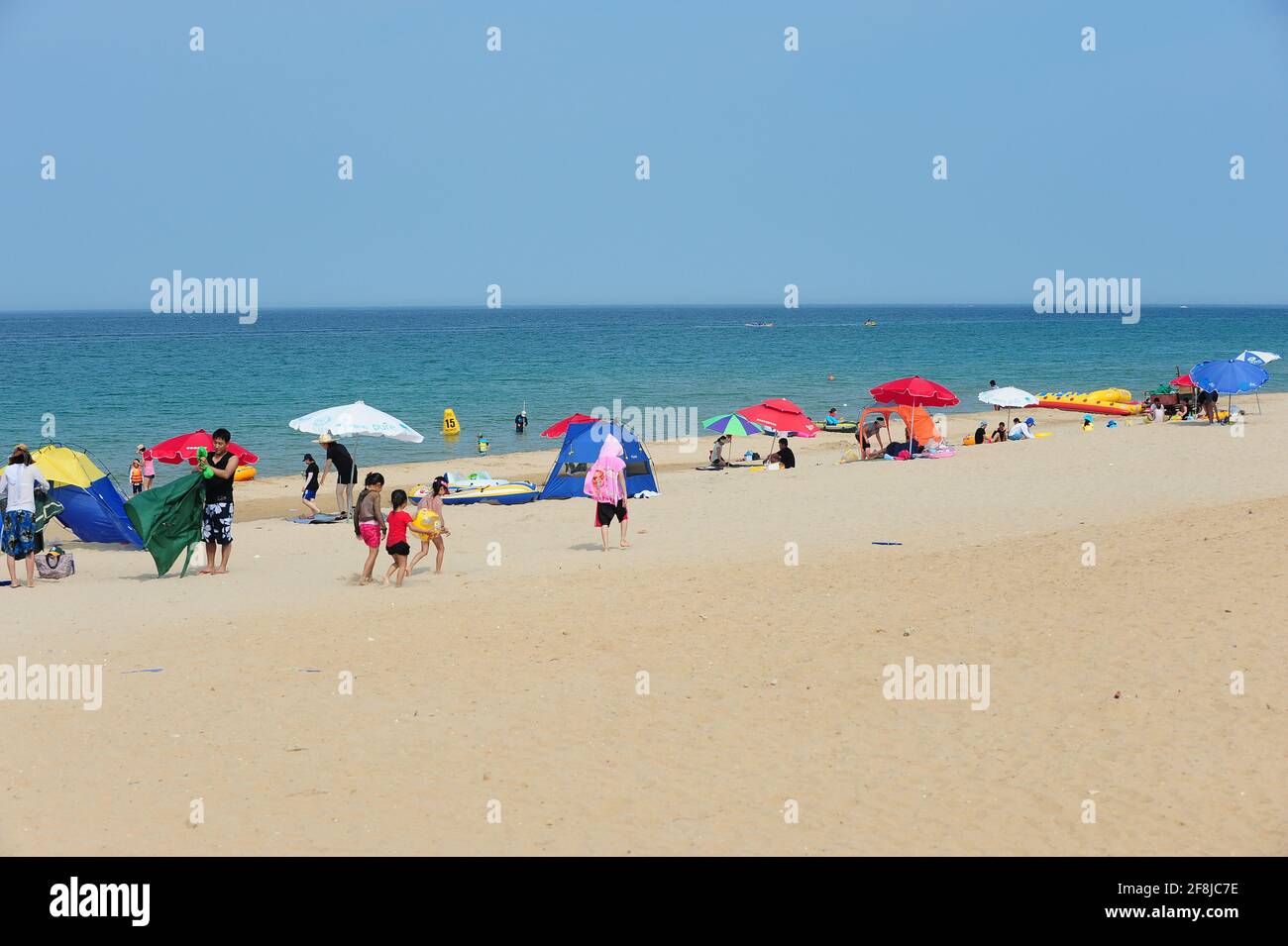 A cool beach in midsummer Stock Photo - Alamy