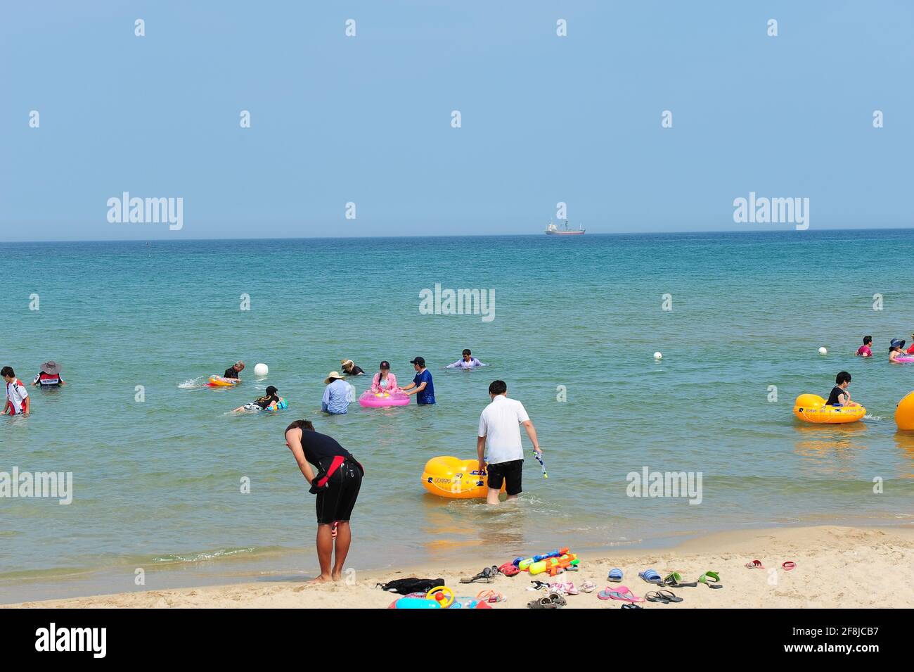 A cool beach in midsummer Stock Photo - Alamy