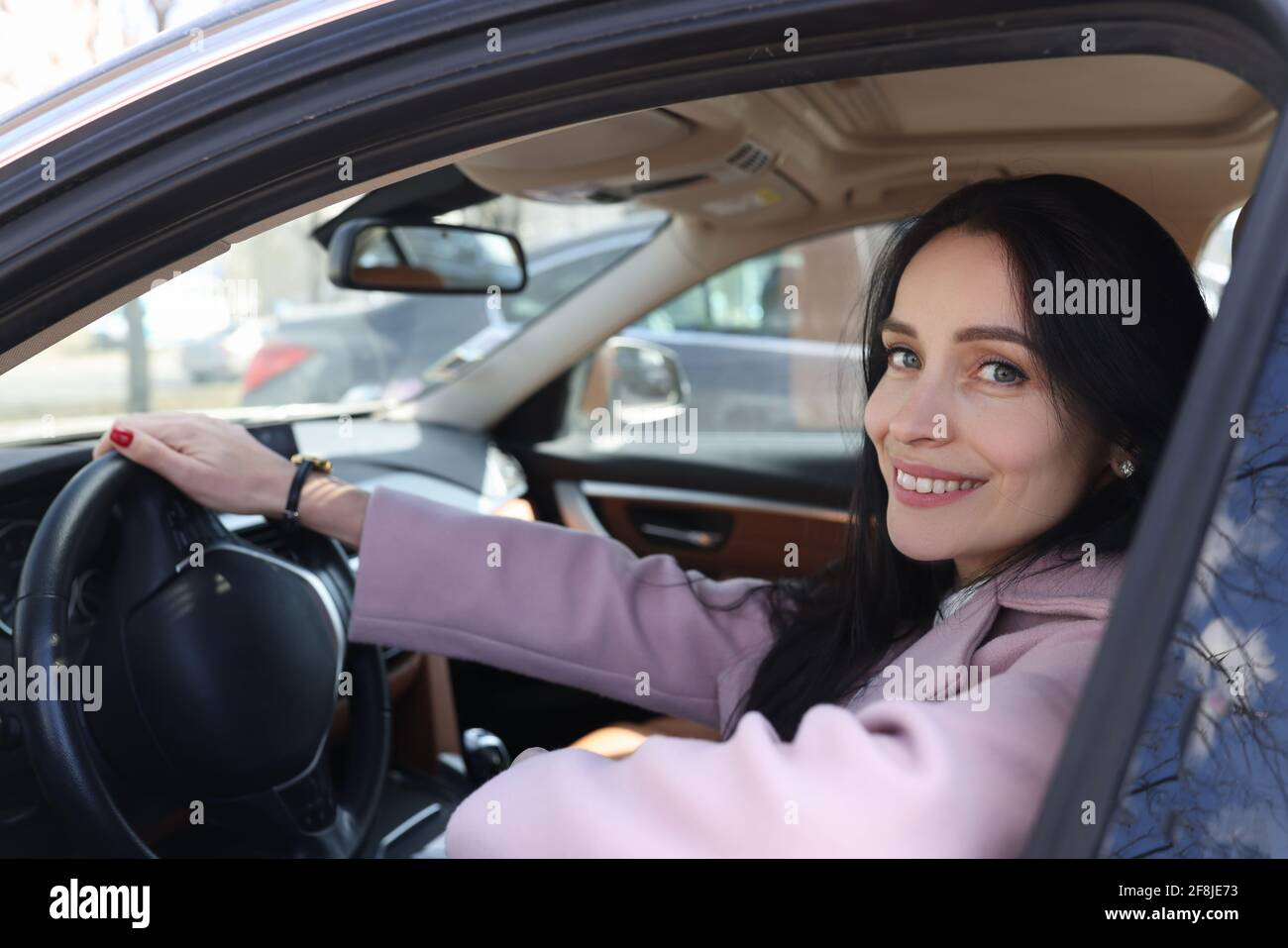 Beautiful woman driving taxi hi-res stock photography and images - Alamy
