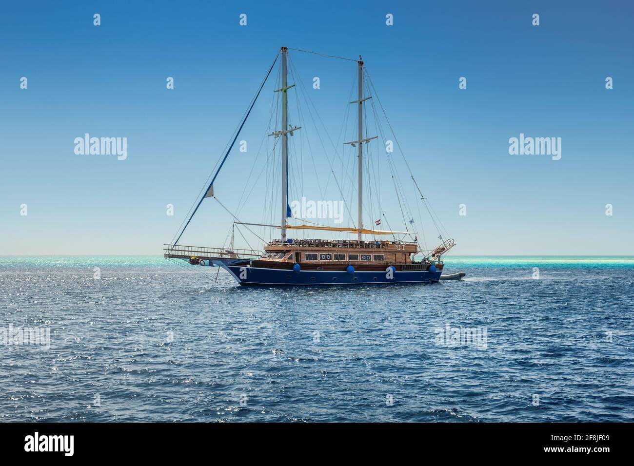 Cruise sail yacht in tropical sea in paradise island Stock Photo - Alamy