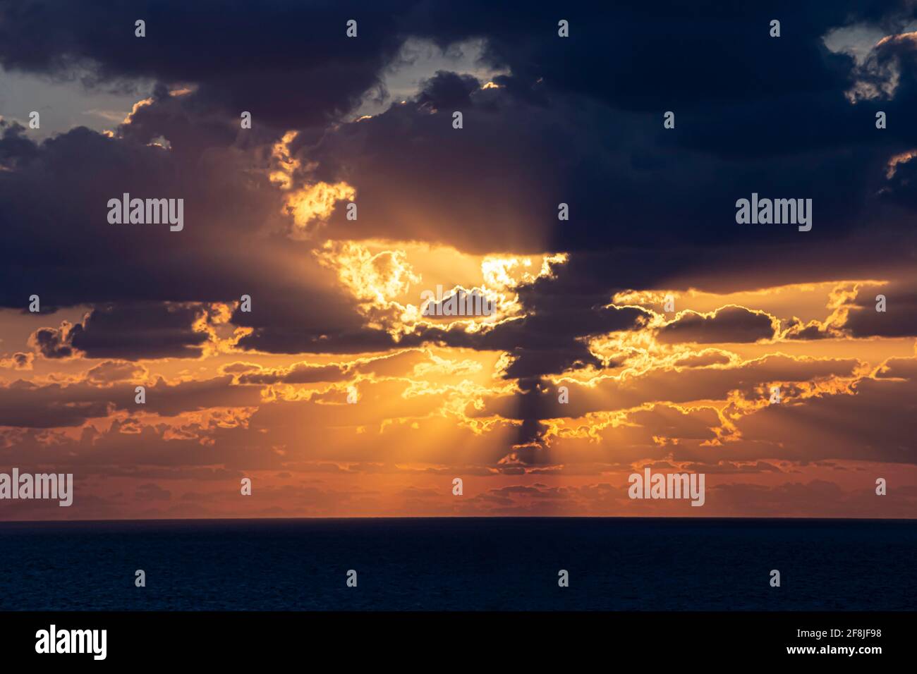 Tropical twilight sunbeams hi-res stock photography and images - Alamy