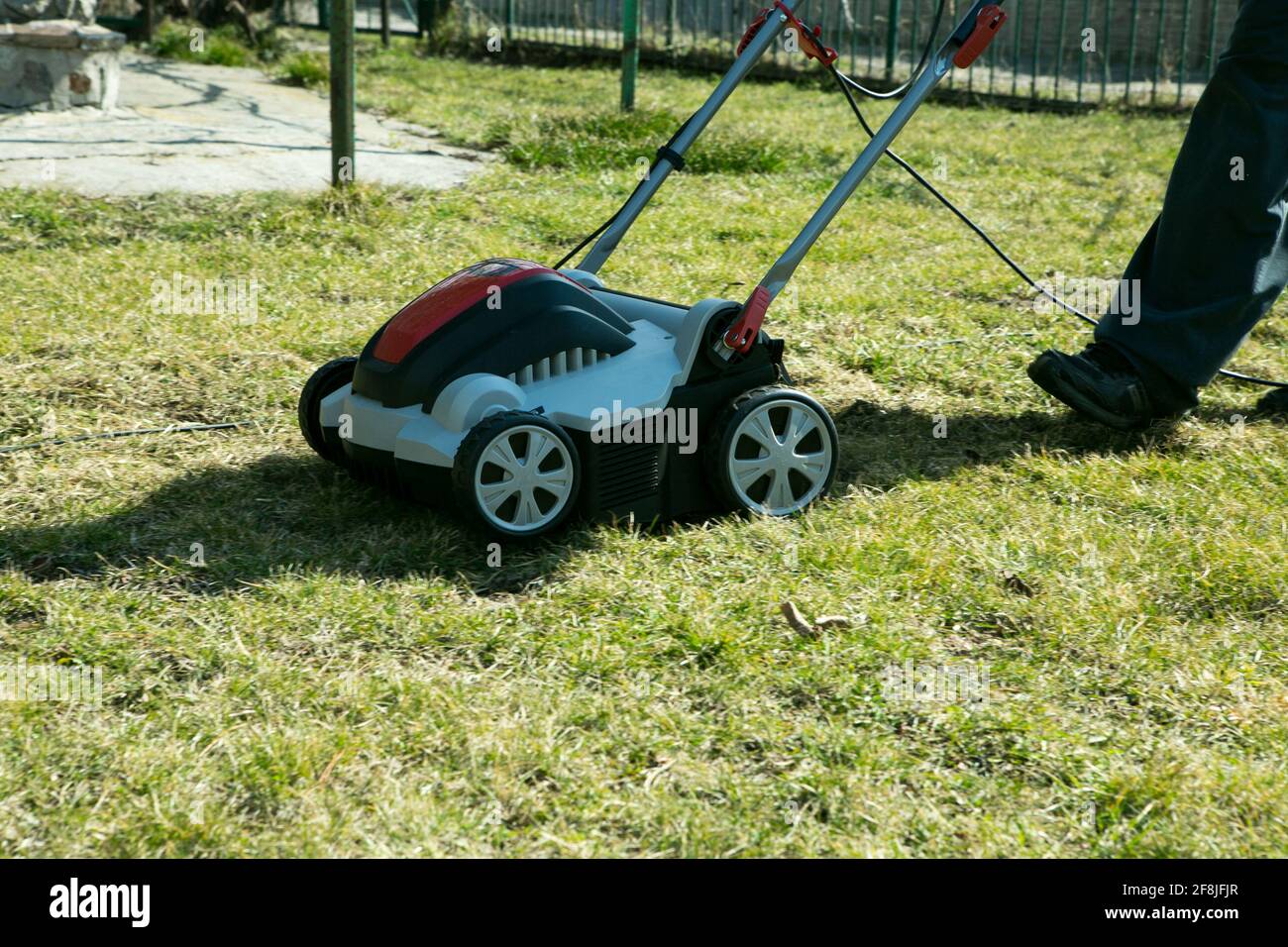 Aeration with a scarifier. Using a scarifier in the garden to improving ...