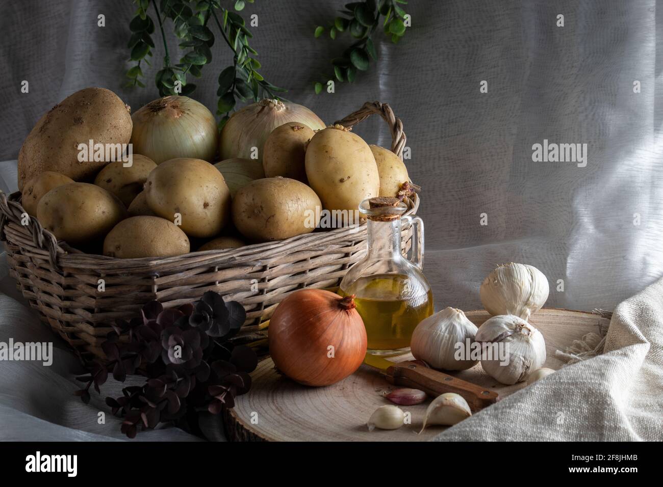 Potato basket on white background horizontal Stock Photo - Alamy