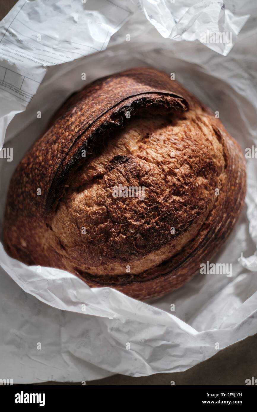 Loaf of bread wrapped hi-res stock photography and images - Alamy