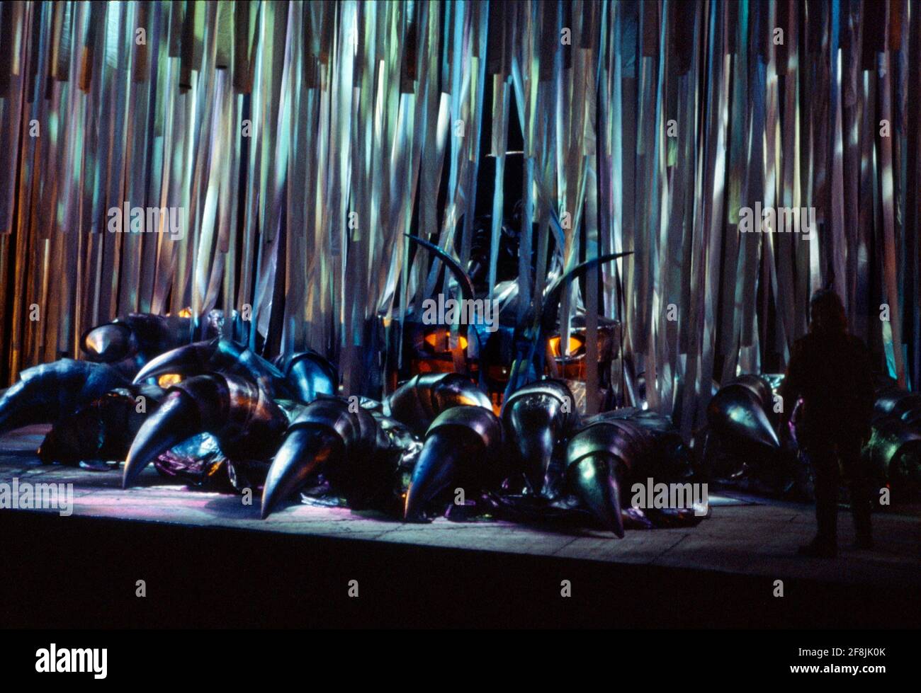 Siegfried (right) confronts Fafner disguised as a dragon in SIEGFRIED ...