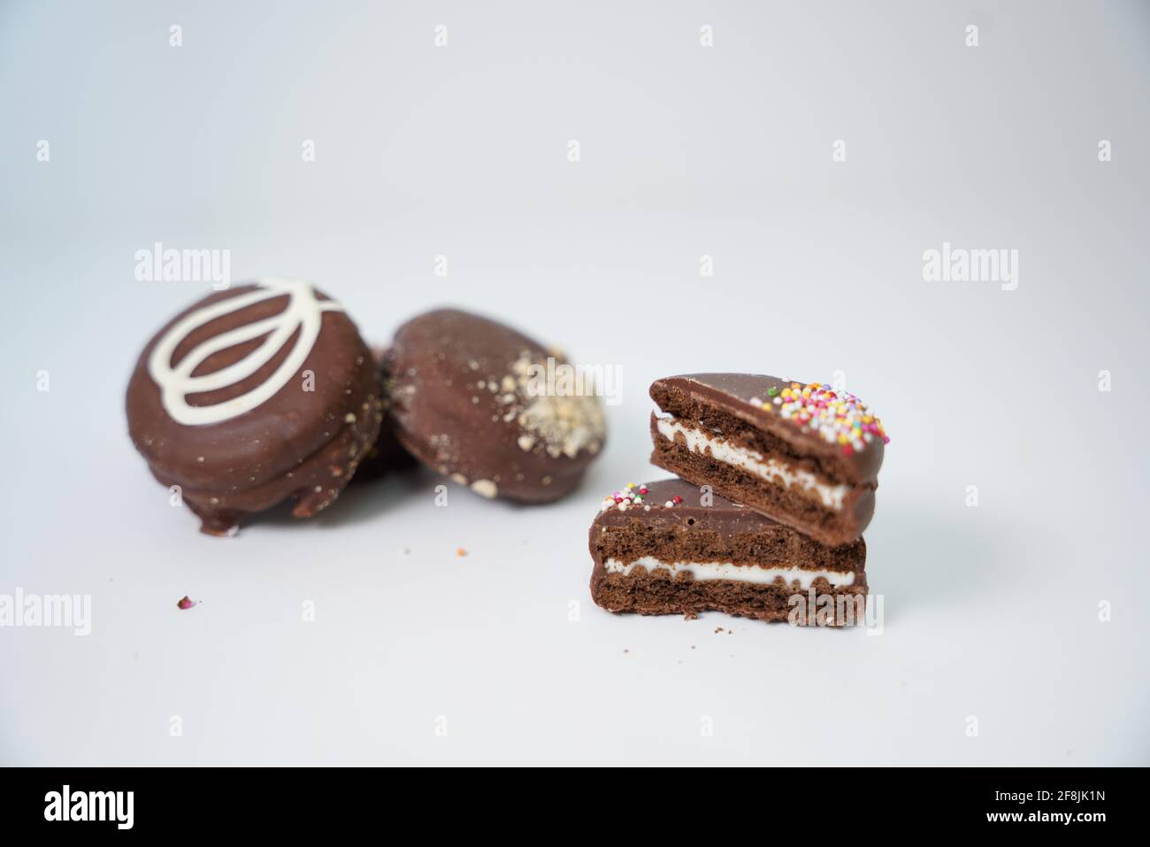 Closeup shot of sweet chocolate candies isolated on white background ...