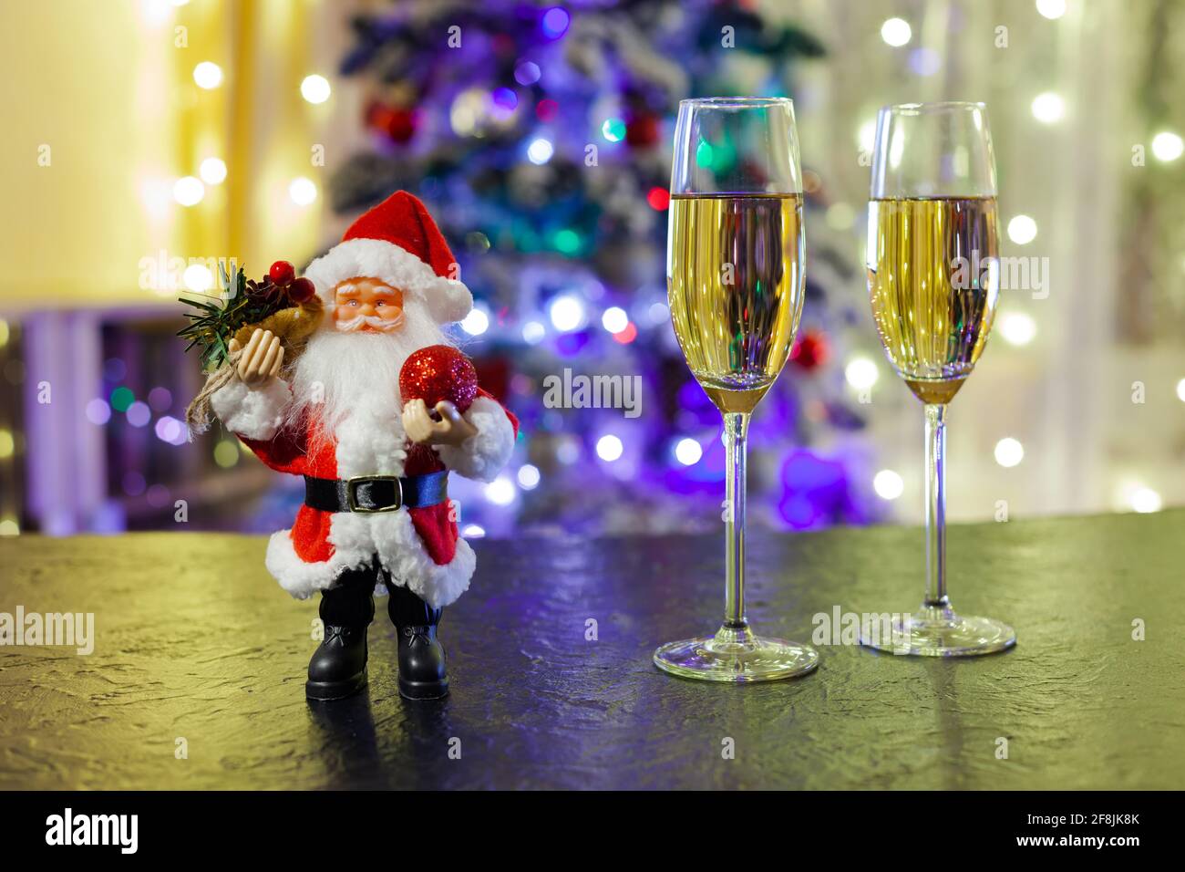 Santa with champagne hi-res stock photography and images - Alamy