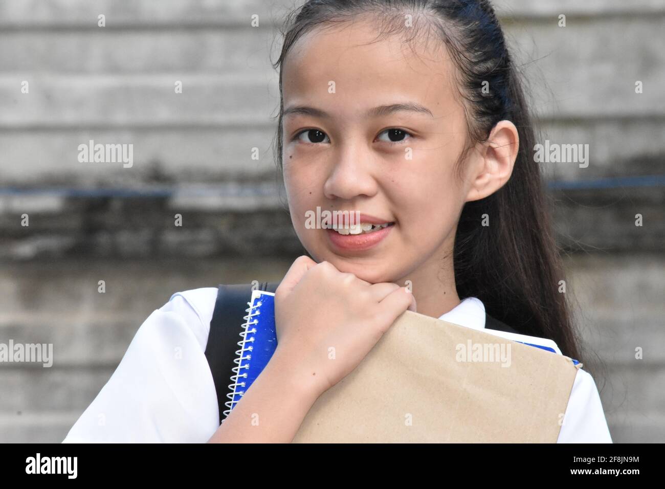Youthful Filipina Girl Student Portrait With School Books Stock Photo ...