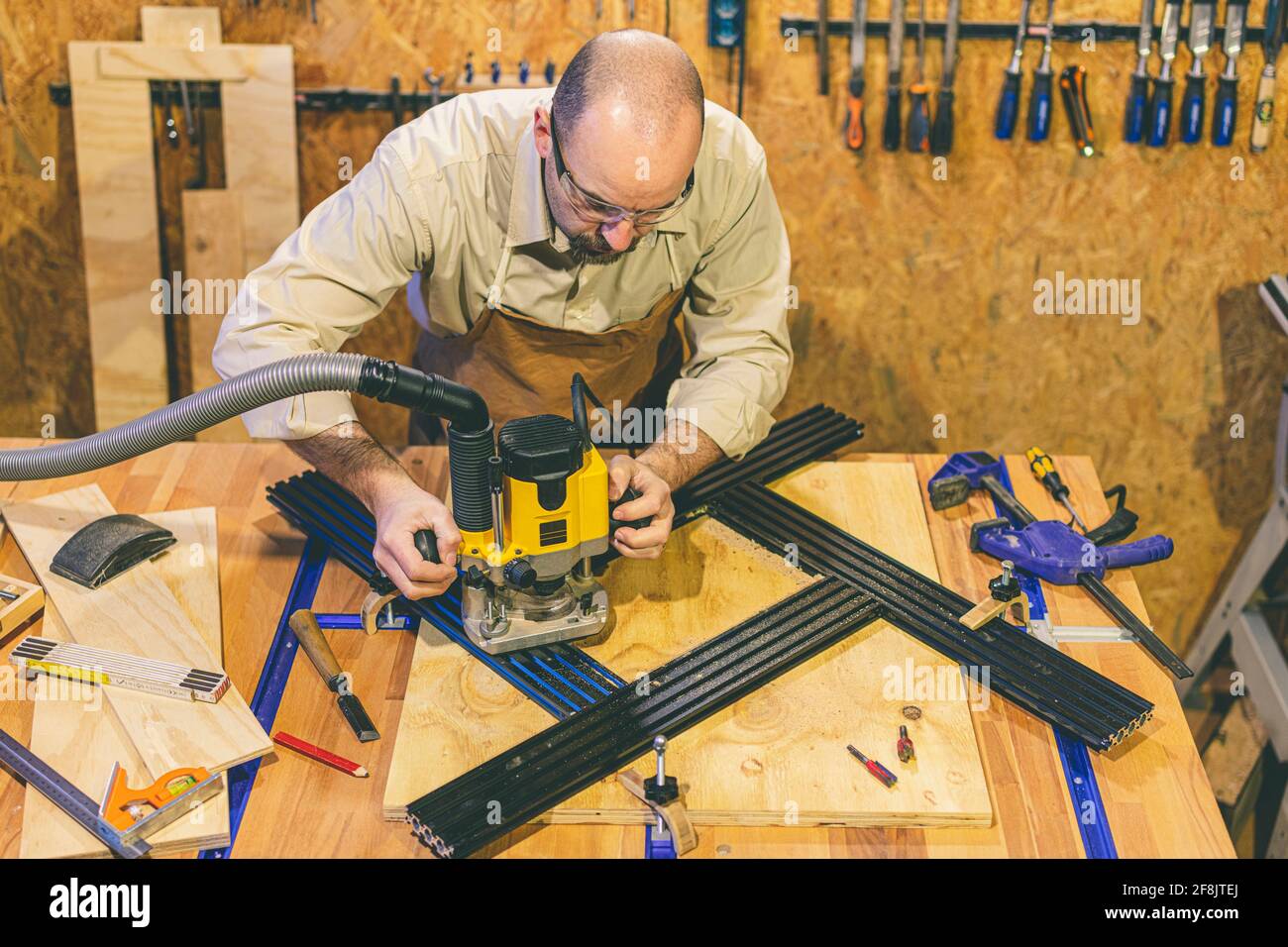 wood craftsman using a vertical milling machine Stock Photo - Alamy