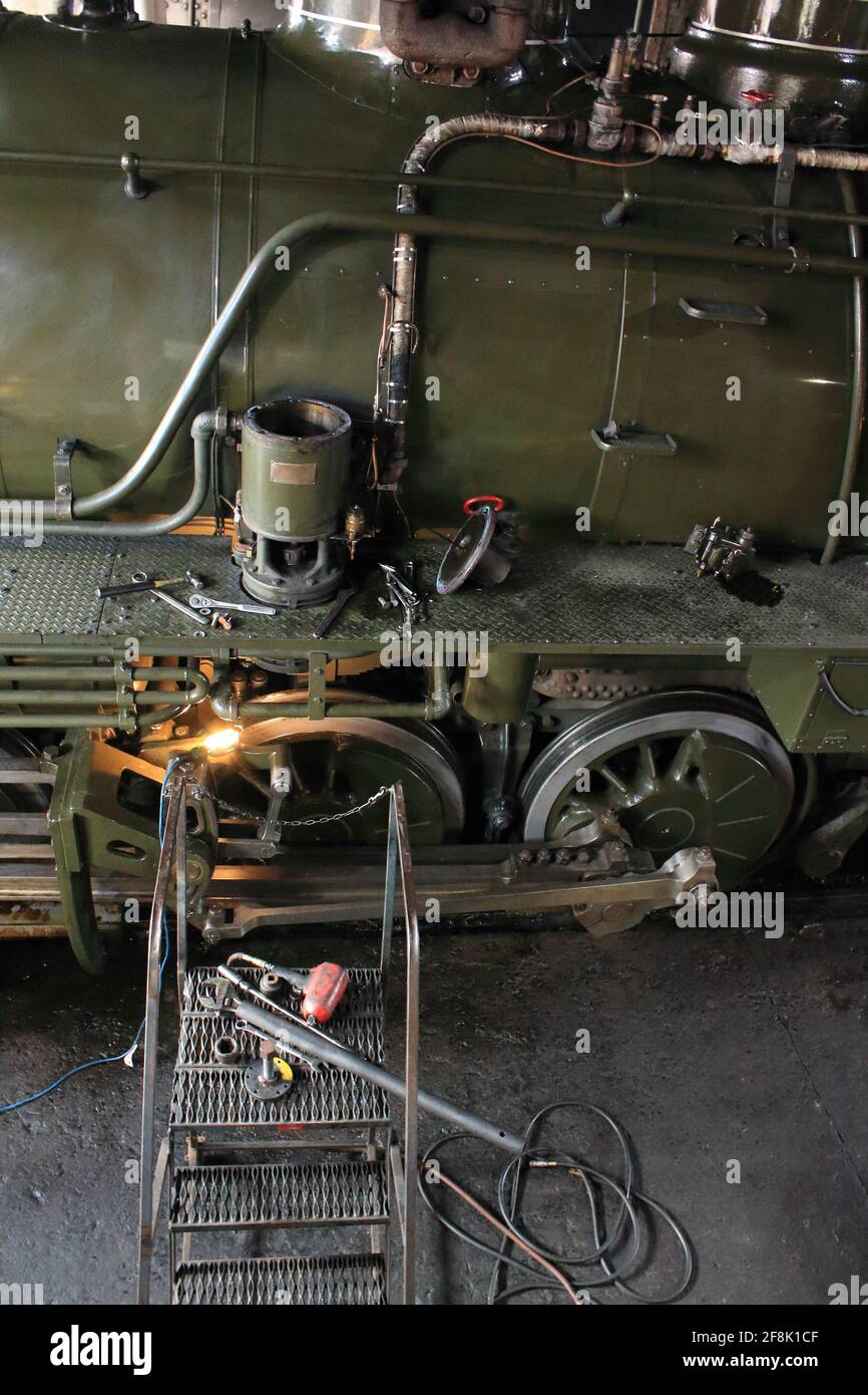 Steam train / loco in for repair Stock Photo - Alamy