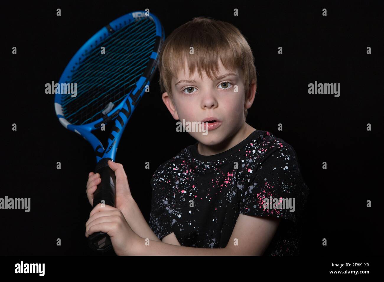 Boy with his tennis racket Stock Photo - Alamy
