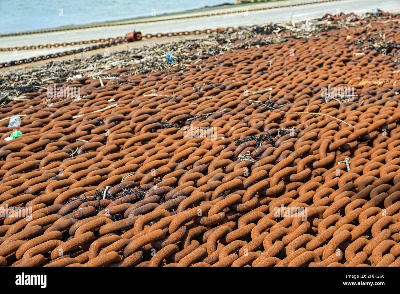 Rusty chains beside the loading slipway to the Torpoint Ferries. The ...