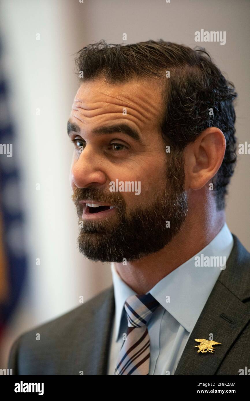 Decorated military veterans, including Navy SEAL Marcus Capone, meet ...