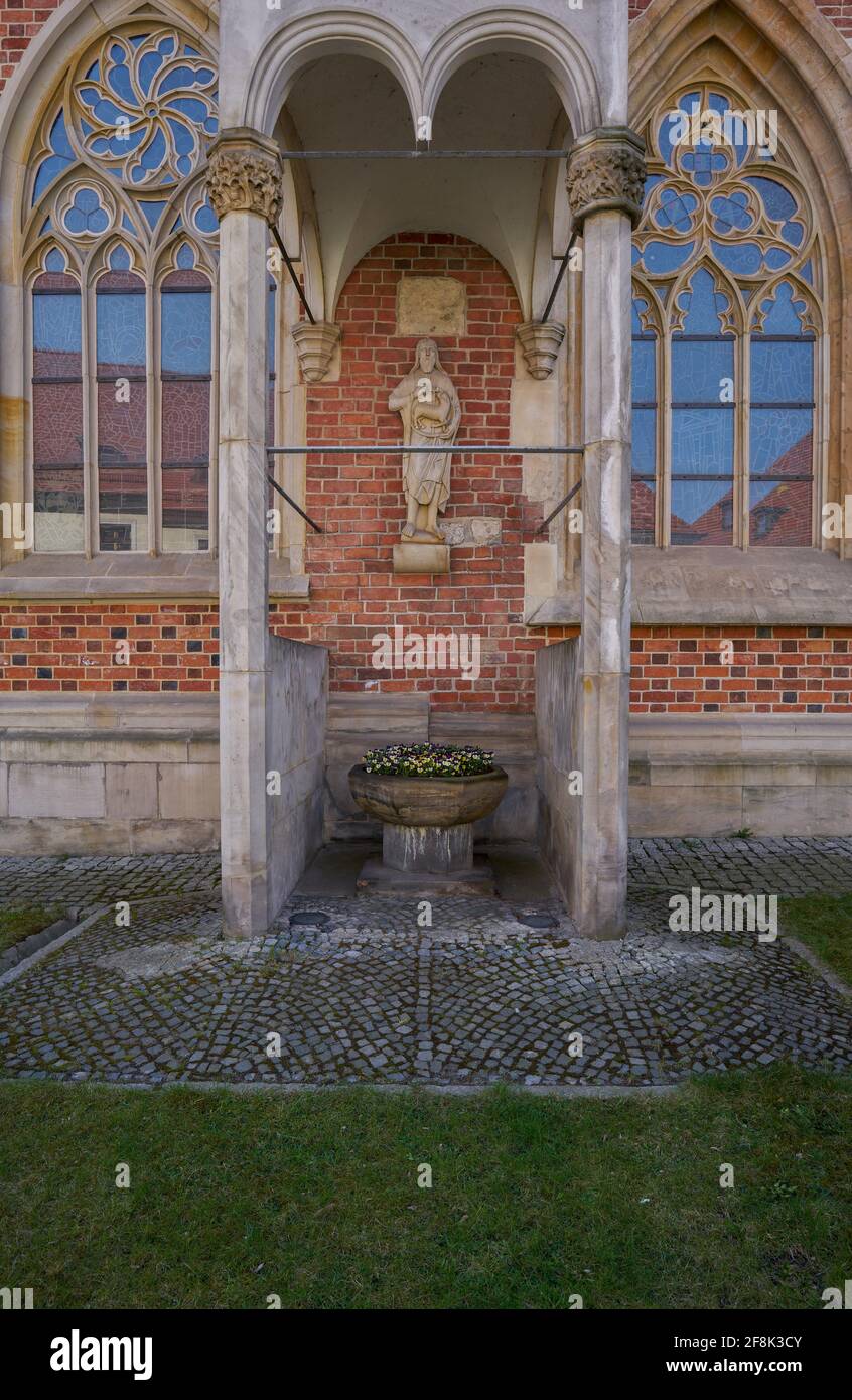 Stone old baptismal font turned into a flower pot hi-res stock ...