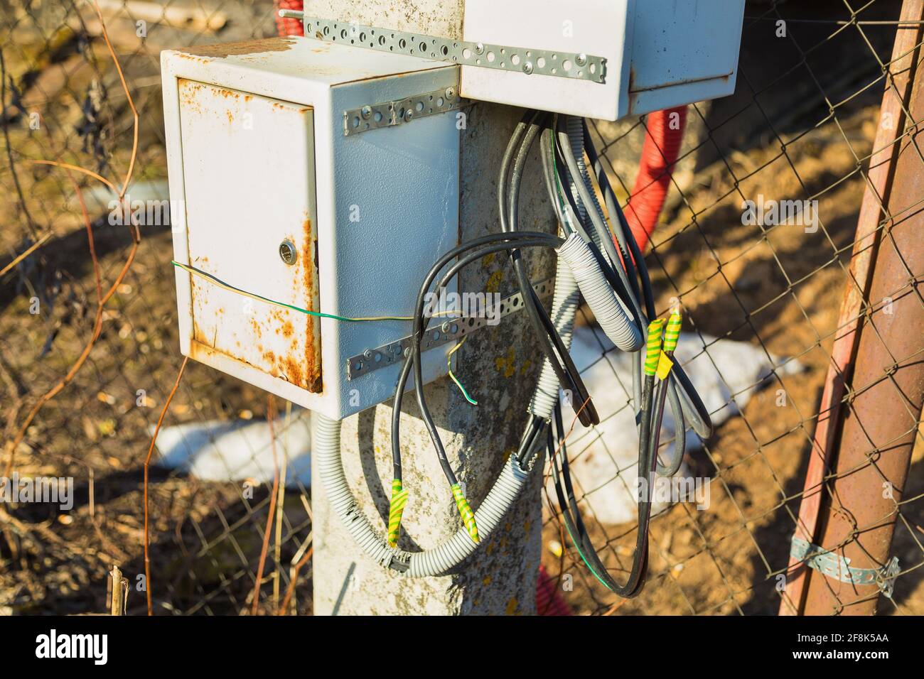 Junction box for connecting electrical wires. Attached to the lamppost ...