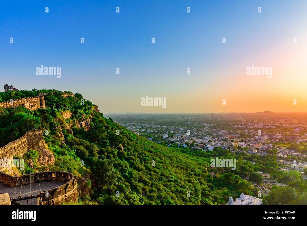 View during sunset from Chittor or Chittorgarh Fort with city in ...