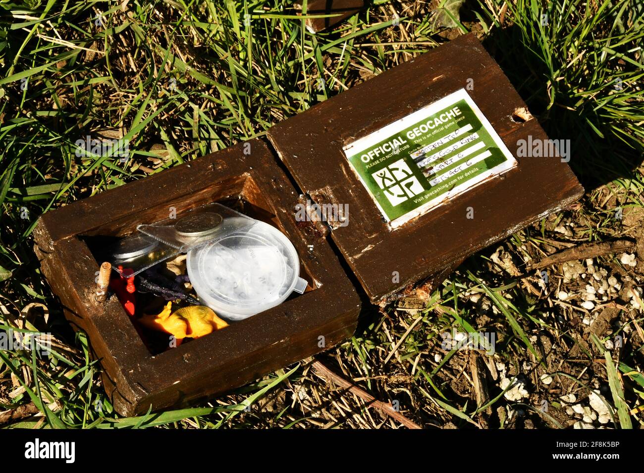 A soundly constructed geo caching container showing it official label ...