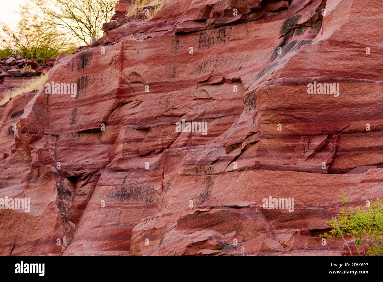 Sandstone forms when layers of sand accumulates by sedimentation are ...