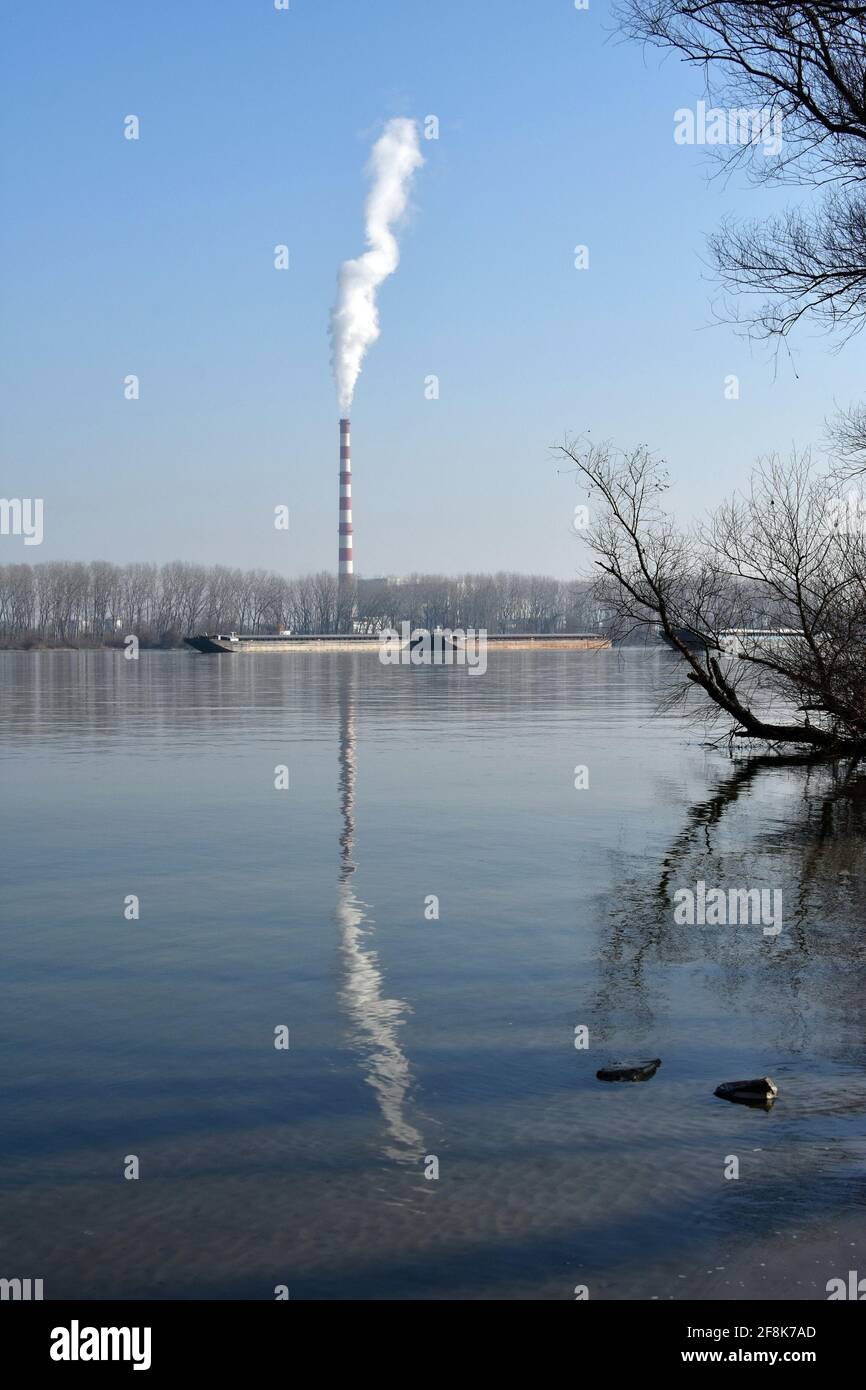 Heavy industry plant making smoke and steam damaging nature causing ...