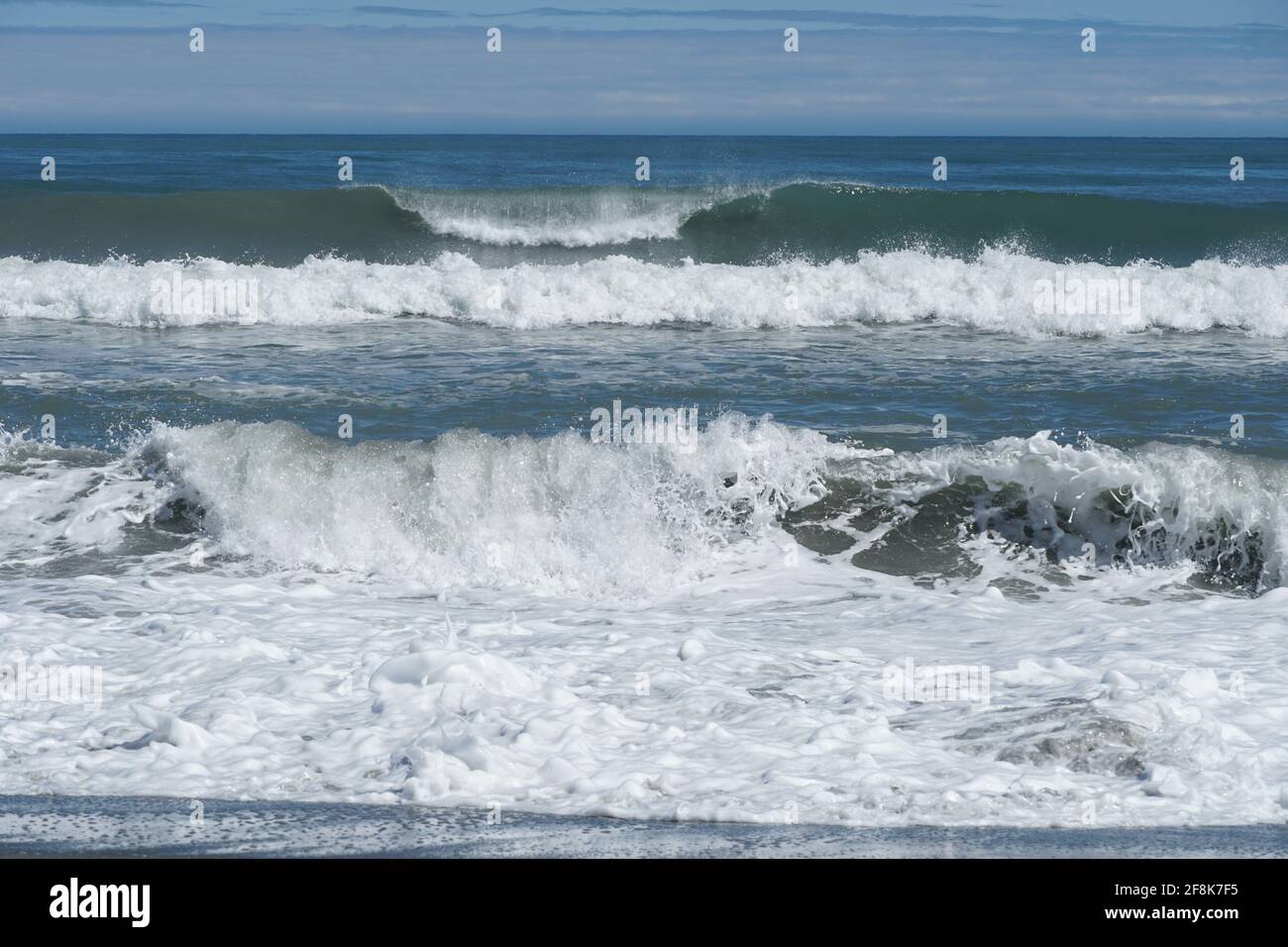 Big waves of the sea on a windy day Stock Photo - Alamy