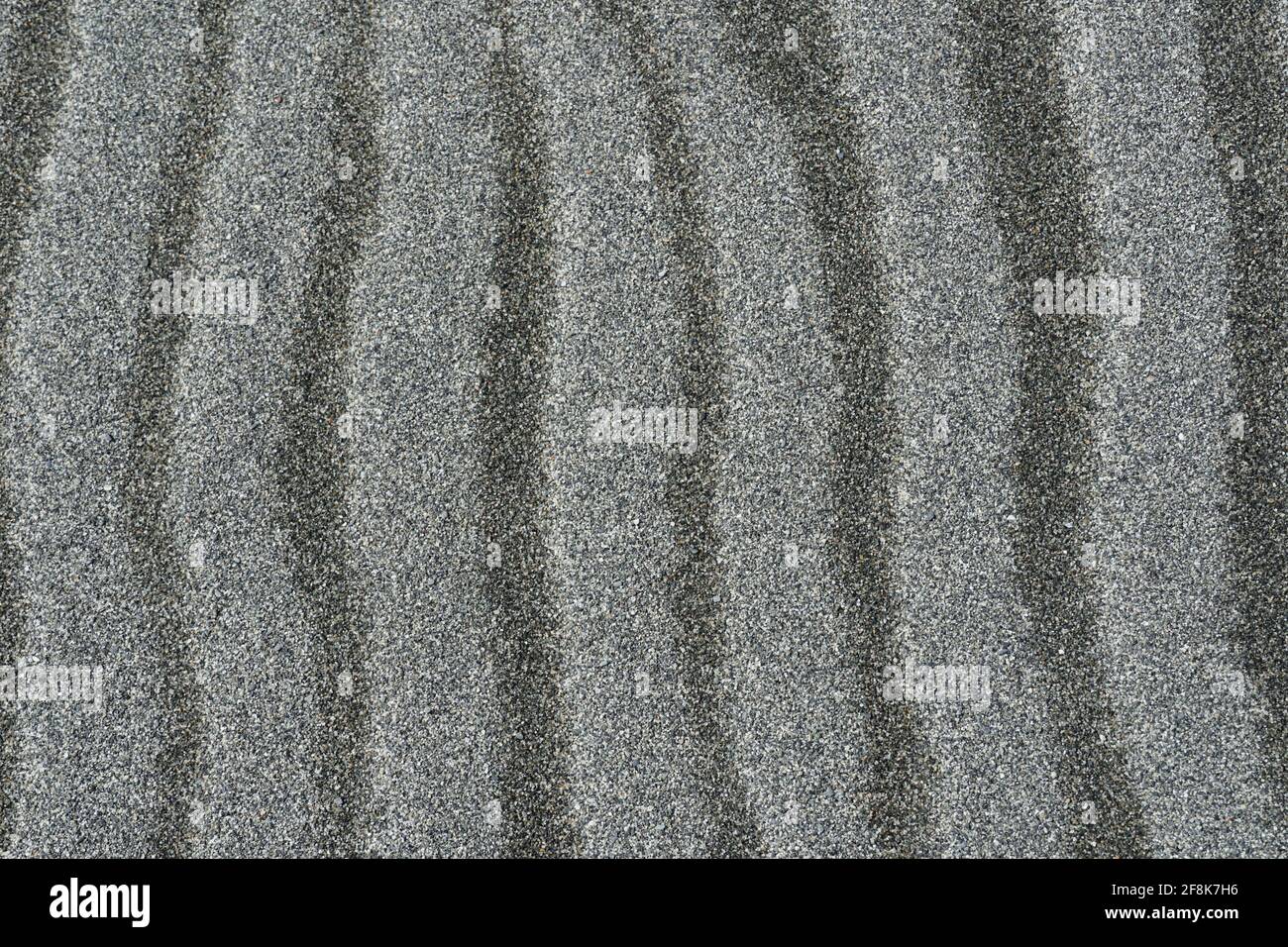 Grey sand texture at the beach after the wind Stock Photo - Alamy