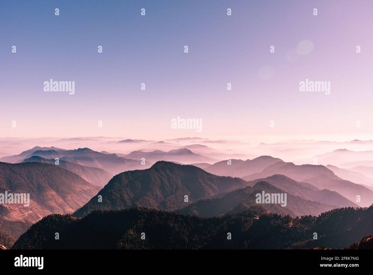 View of Himalayas mountain range with visible silhouettes through the ...
