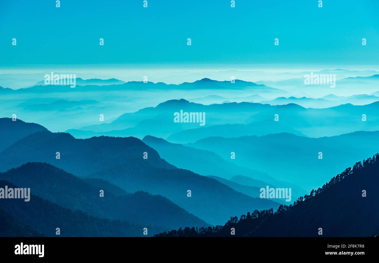 View of Himalayas mountain range with visible silhouettes through the ...