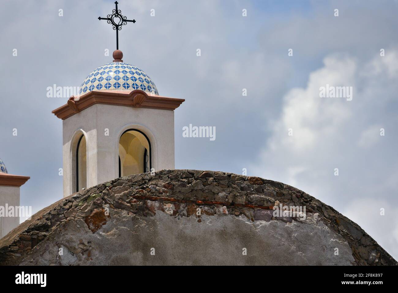 Bell tower with a Talavera tile cupola in the historic center of San ...