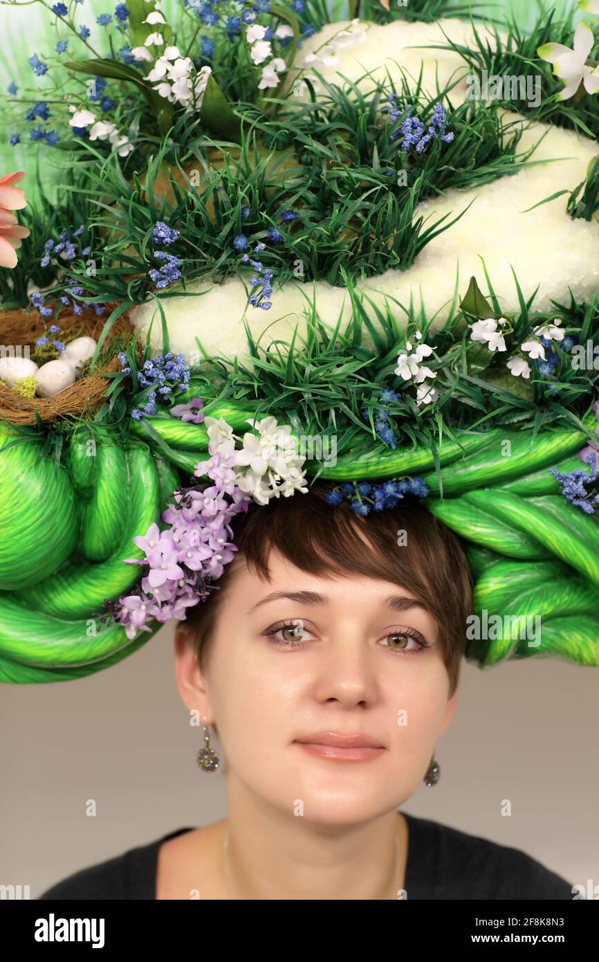 Portrait of woman in a spring crown Stock Photo - Alamy