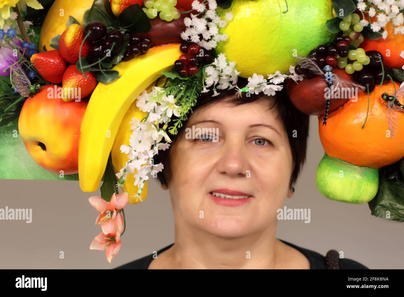 Portrait of mature woman in a summer crown Stock Photo - Alamy