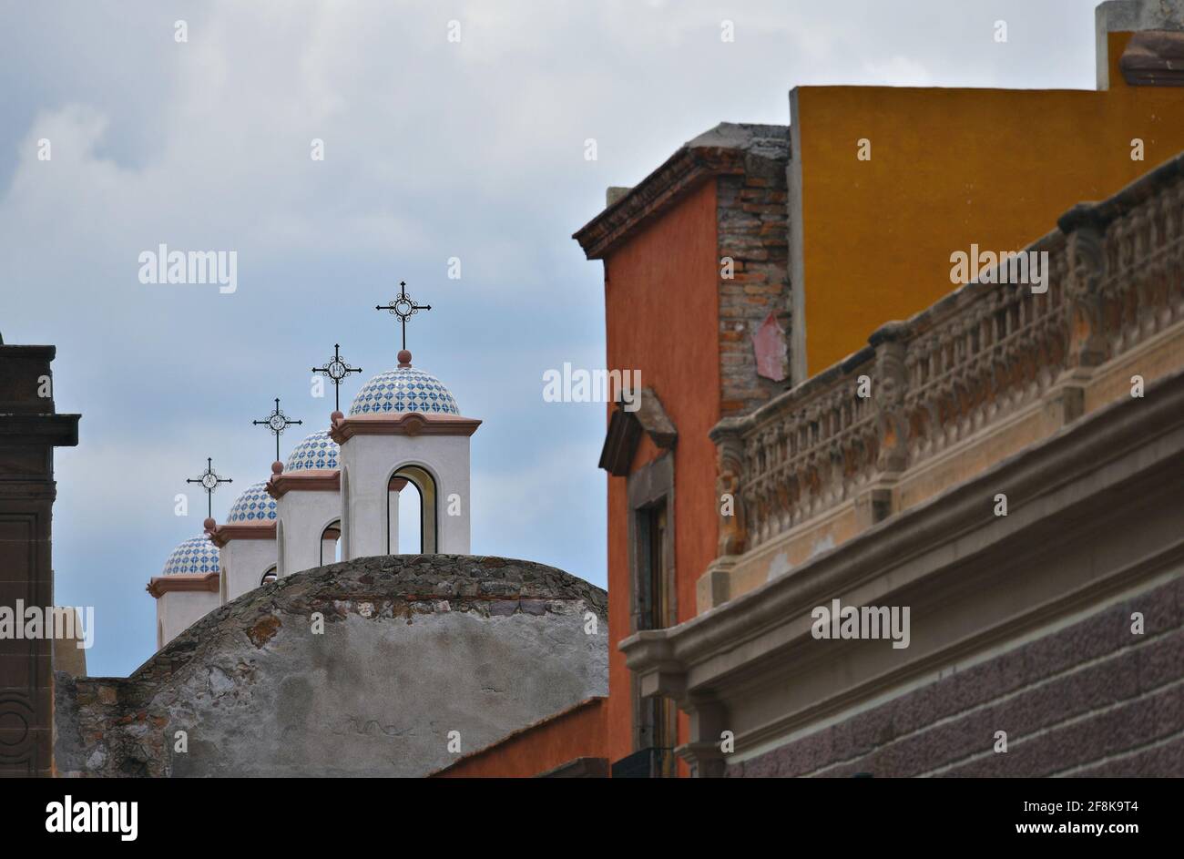 Bell towers with a Talavera tile cupola in the historic center of San ...