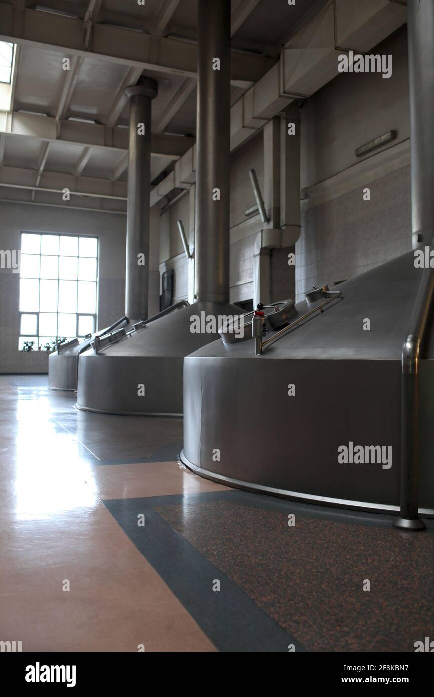 The fermentation vats of a modern brewery Stock Photo - Alamy