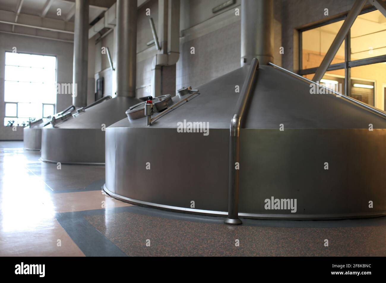 The stainless fermentation vats of a brewery Stock Photo - Alamy