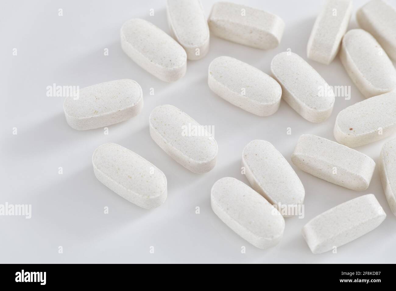 Magnesium taurate tablets. Close up Stock Photo - Alamy