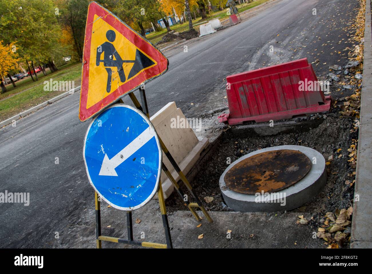 New concrete ring and metal cover of well of underground city ...