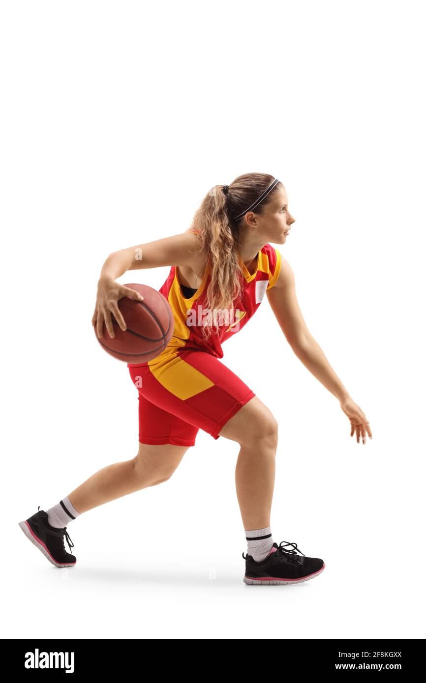 Female basketball player leading a ball isolated on white background ...