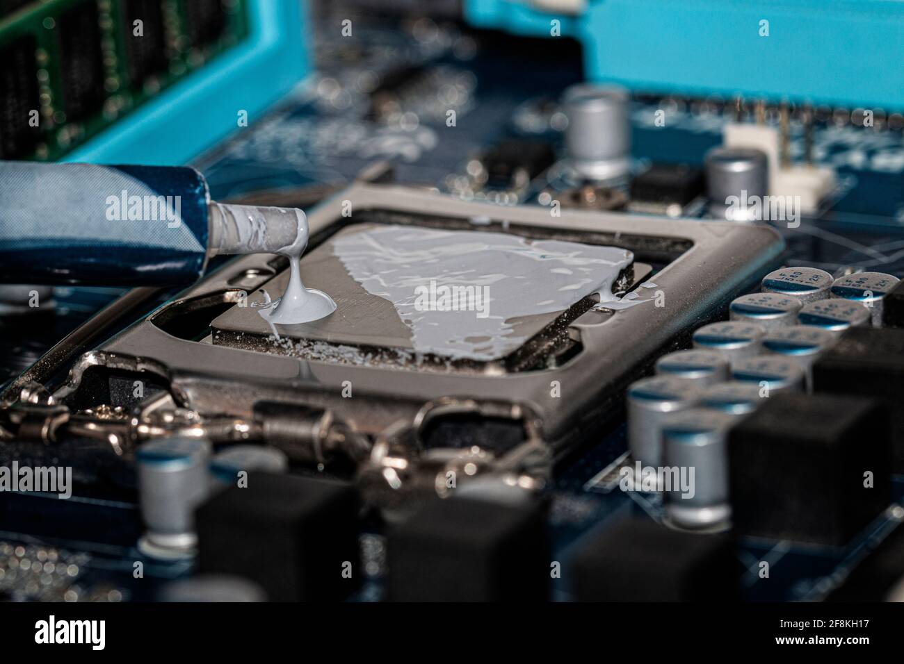 thermal paste is applied to a processor Stock Photo - Alamy