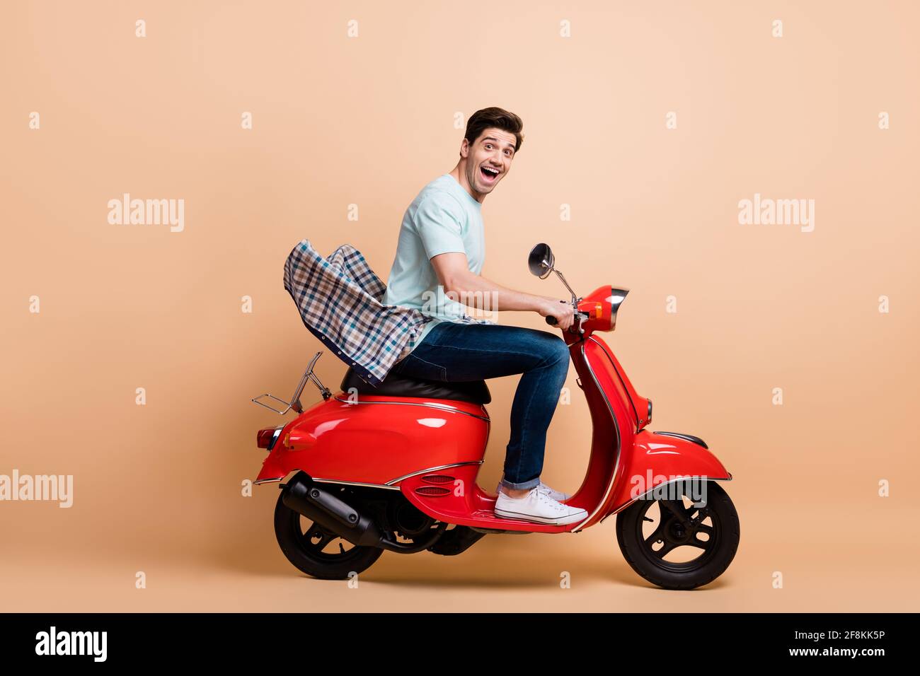 Profile side view portrait of nice funky cheerful guy enjoying driving ...