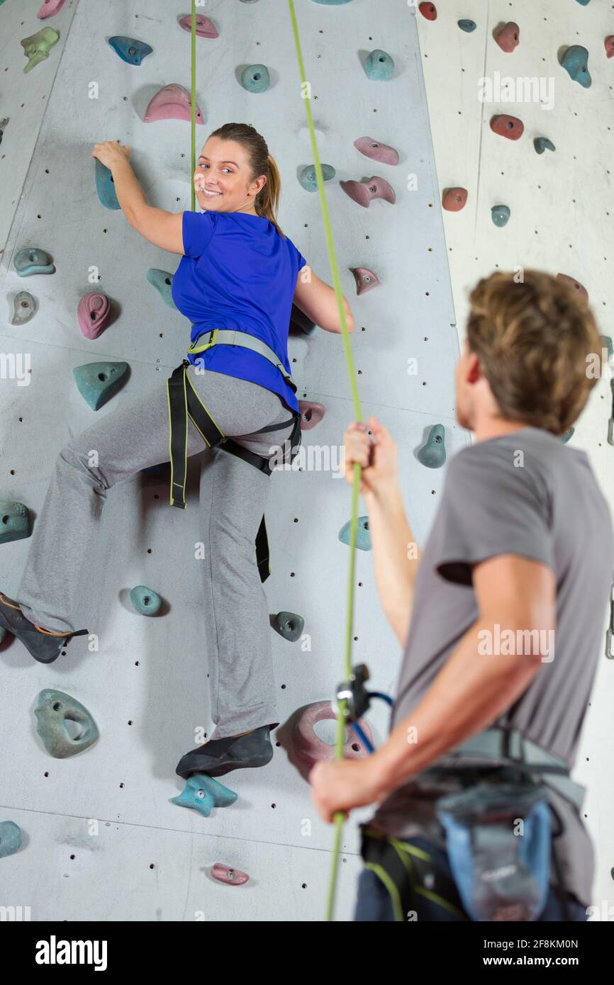 Man scaling climbing wall hi-res stock photography and images - Alamy