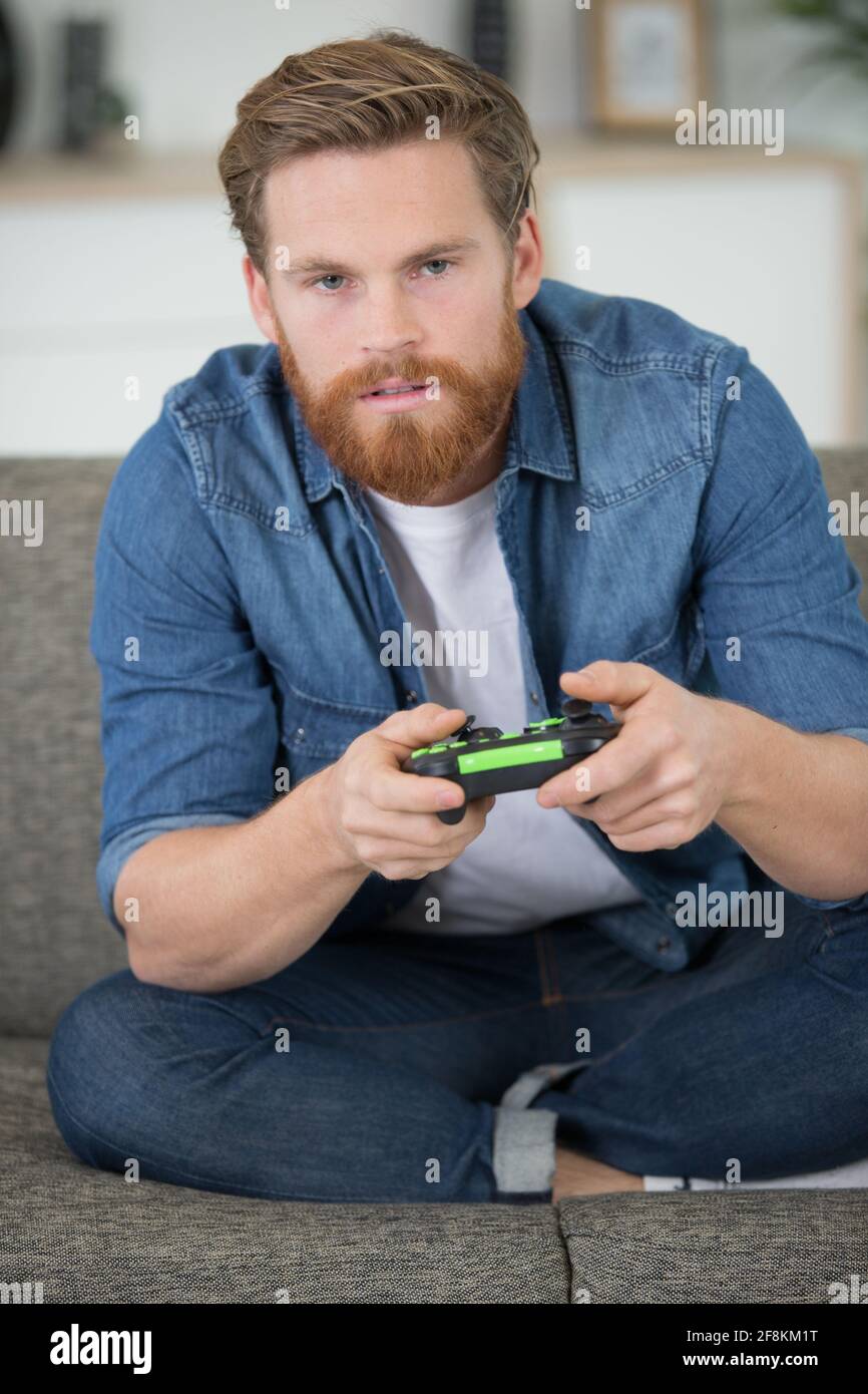 a student playing video game Stock Photo - Alamy