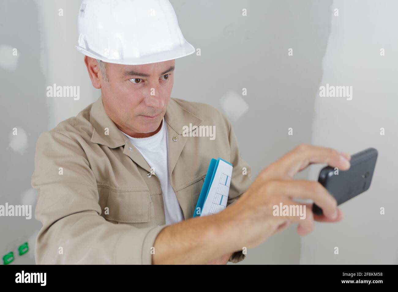 engineer taking photo of a construciton site Stock Photo - Alamy