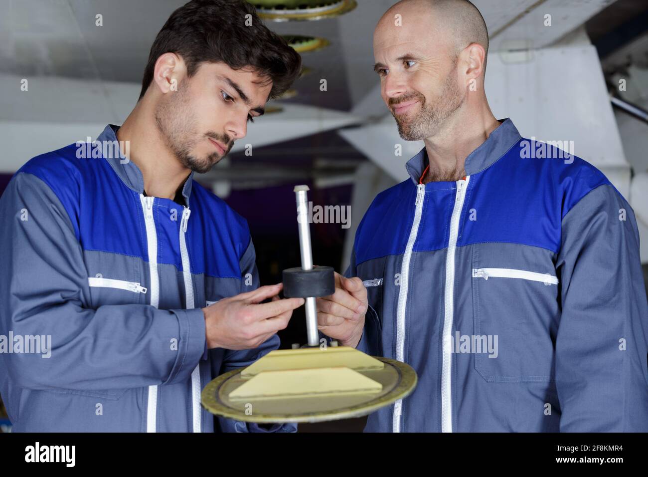 two engineers standing in a factory Stock Photo - Alamy