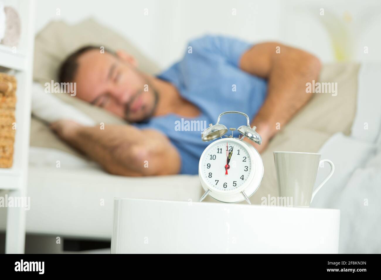 man sleeping in bed Stock Photo - Alamy