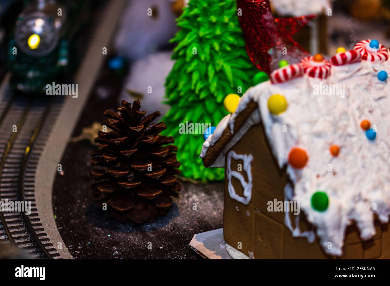 Colorful gingerbread house isolated on blurred background with ...