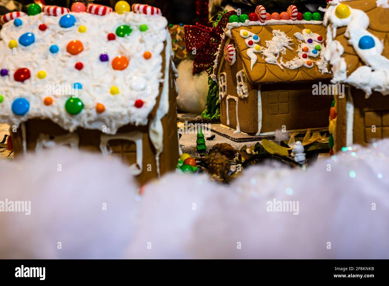 Colorful gingerbread house isolated on blurred background with ...