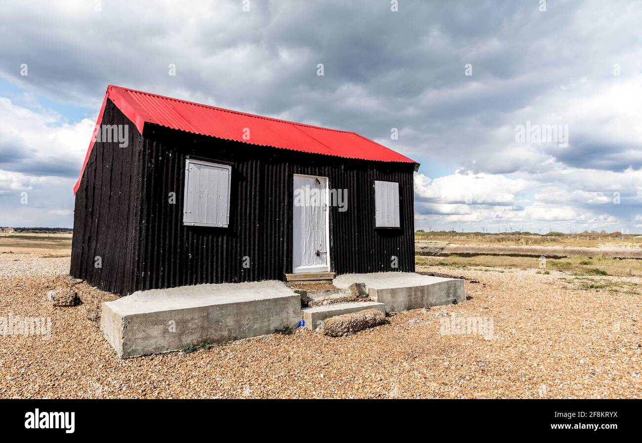 Red roofed hut hi-res stock photography and images - Alamy