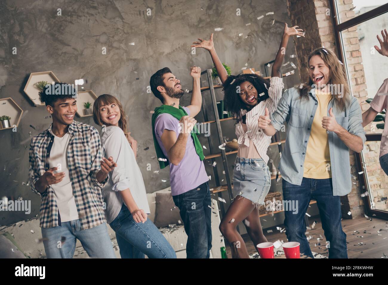 Photo portrait of company celebrating exams ending dancing at party ...