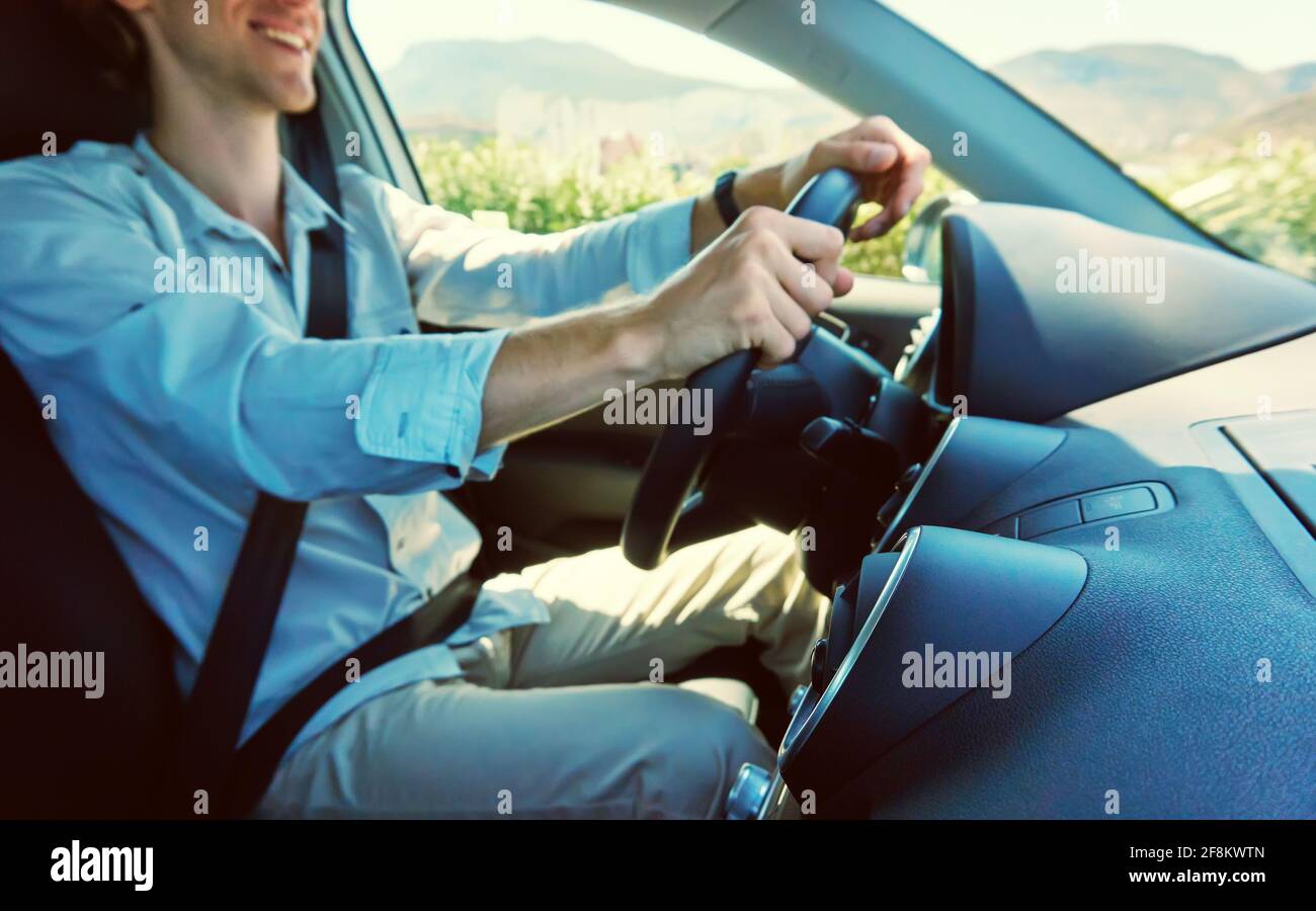 man driving a car. people traveling at the wheel Stock Photo - Alamy