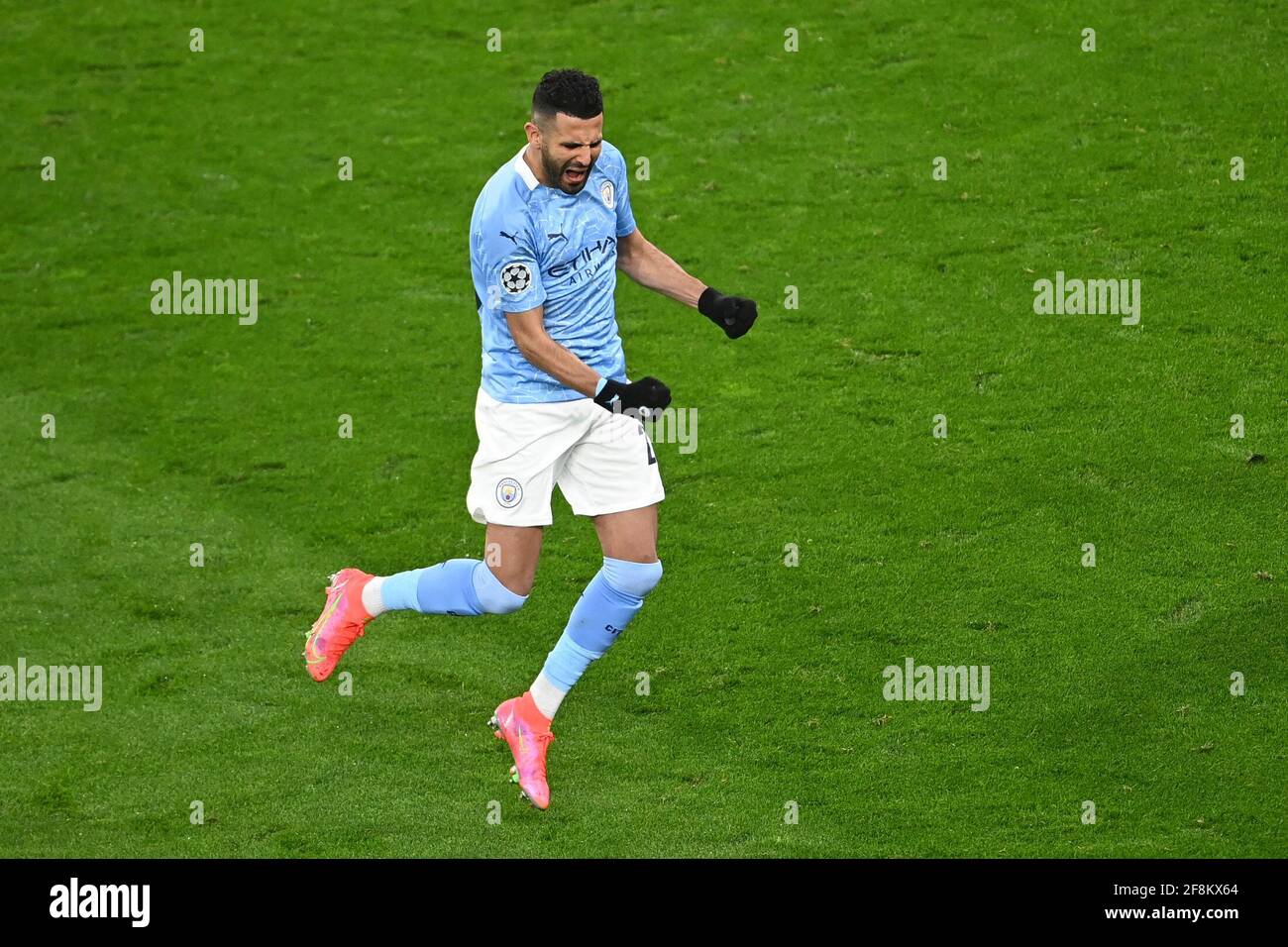 Manchester City's Riyad Mahrez celebrates scoring their side's first ...